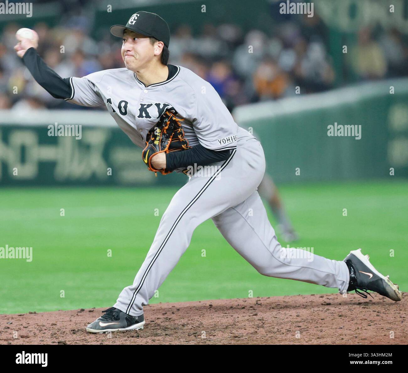 Yomiuri Giants' pitcher Taisei Ota pitches in the ninth inning of the ...