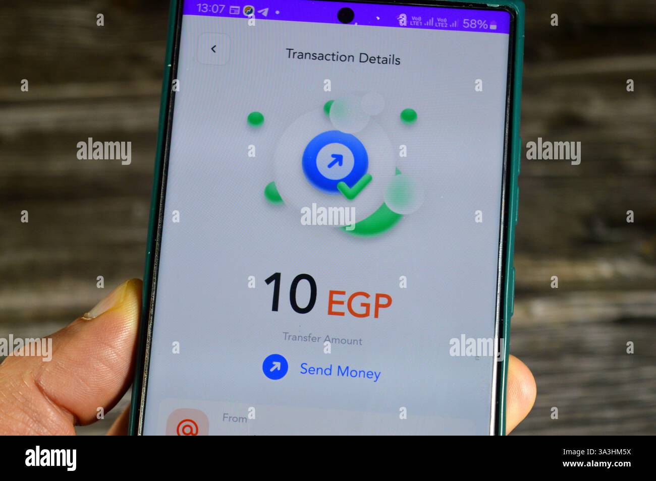 Cairo, Egypt, February 6 2025: money transfer successful transaction on ...