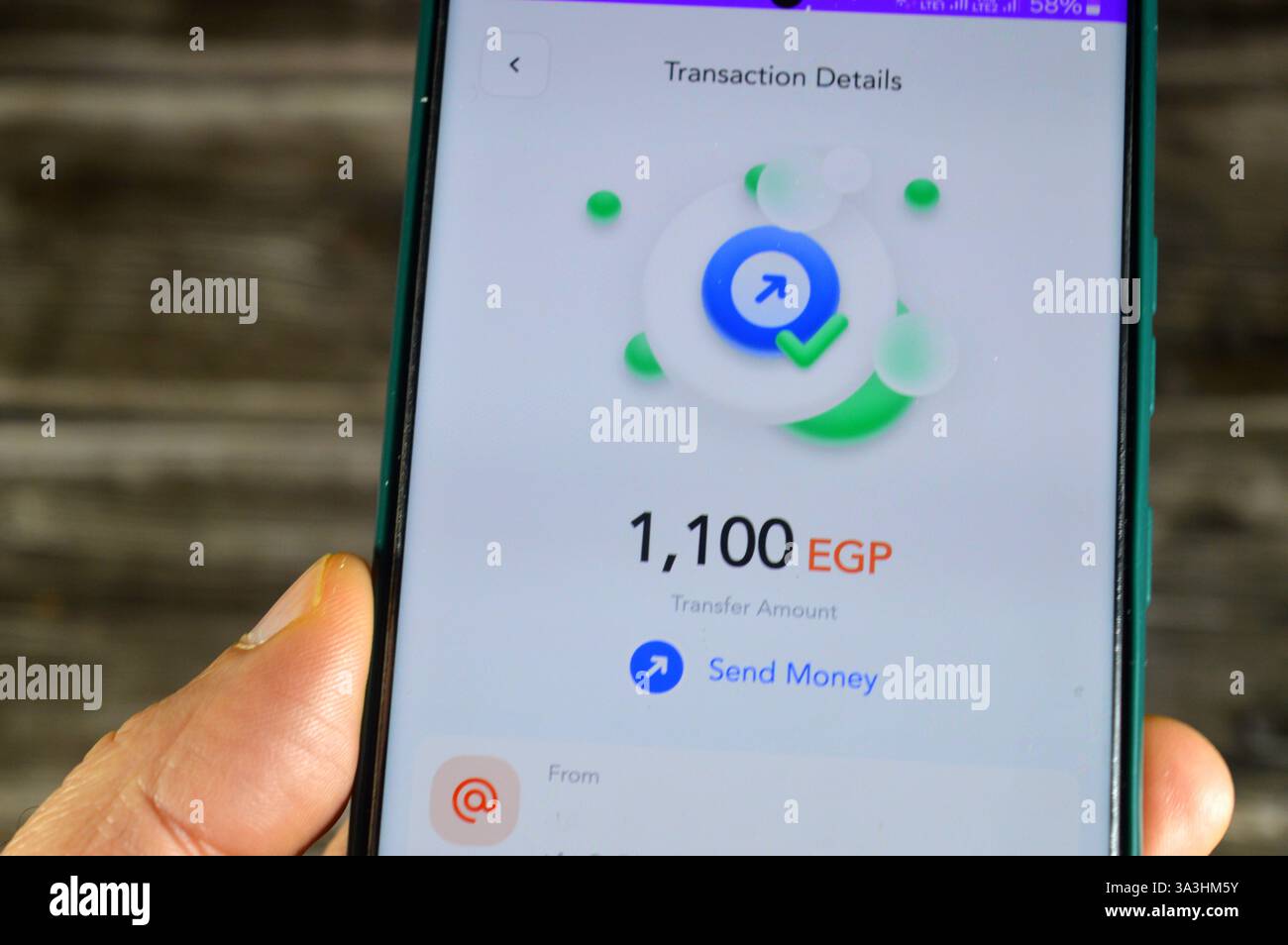 Cairo, Egypt, February 6 2025: Successful money transfer transaction on ...