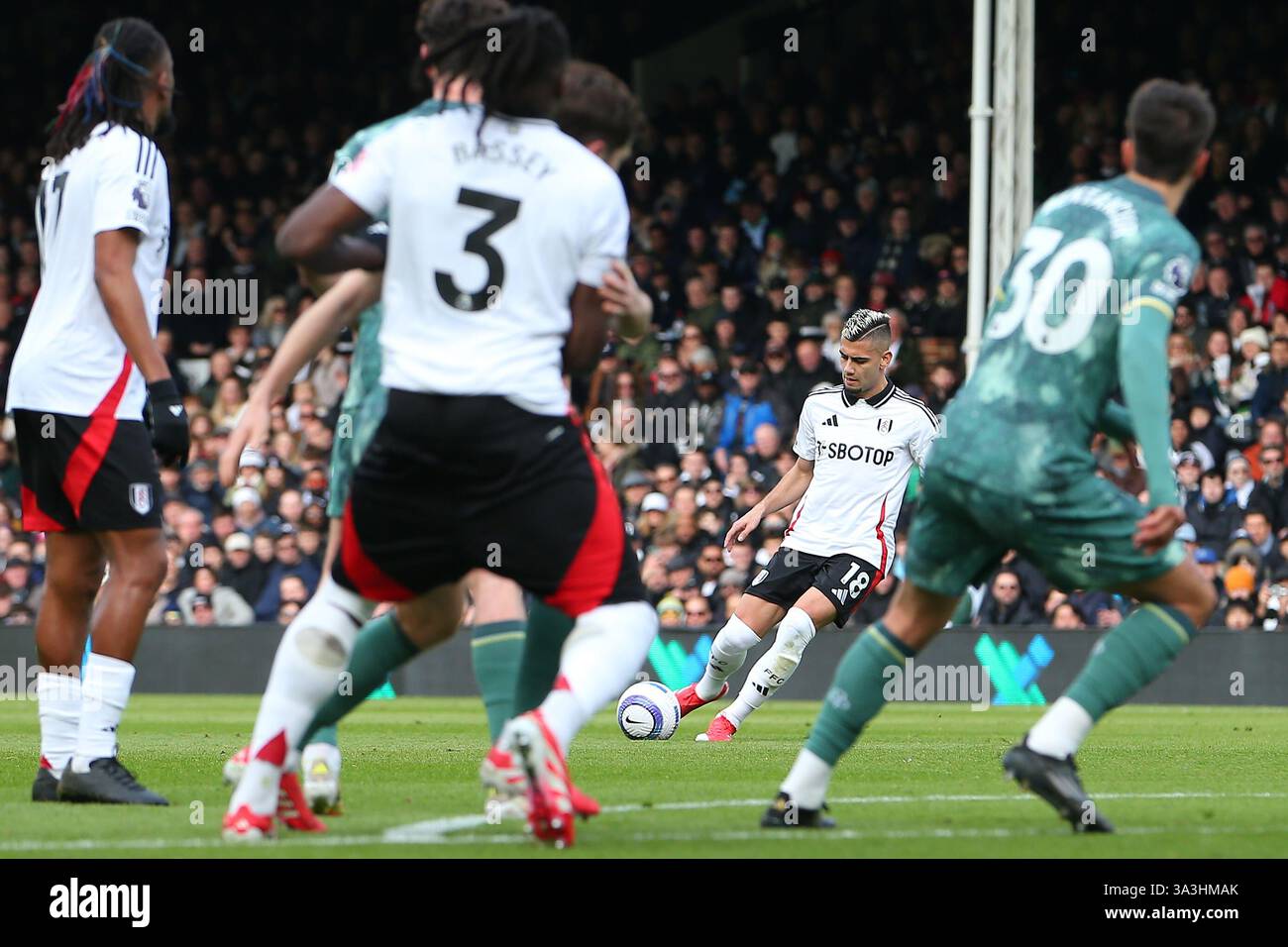 London, UK. 16th Mar, 2025. Andreas Pereira of Fulham crosses from a ...
