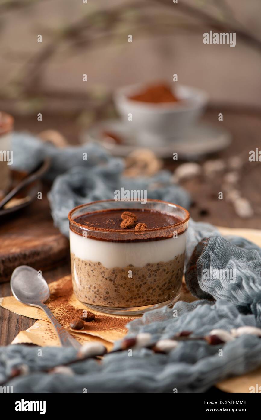Experience a delightful tiramisu-inspired chia pudding, featuring layers of creamy coffee ...