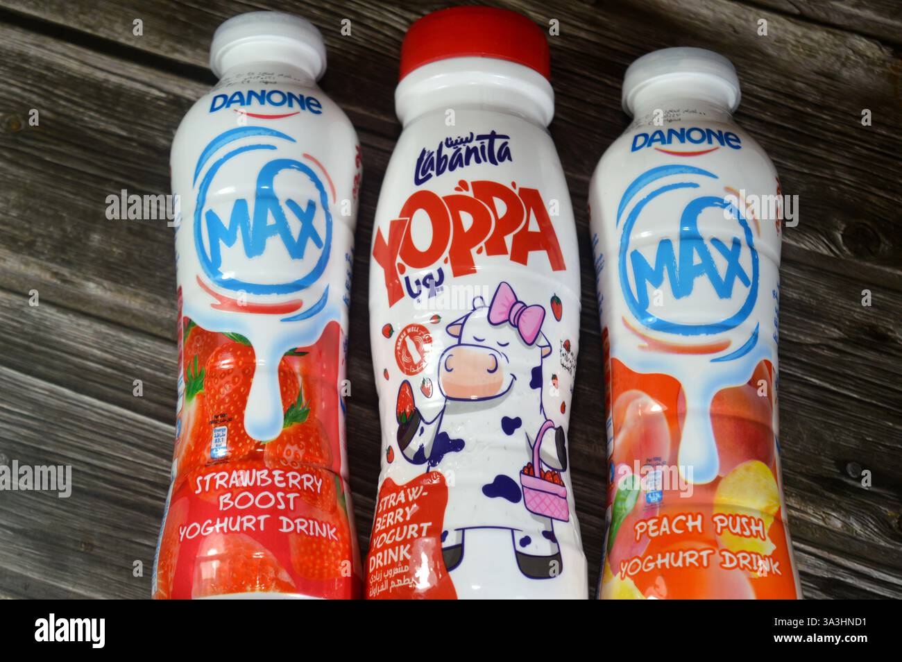 Cairo, Egypt, March 5 2025: Yogurt drink with strawberry and peach ...