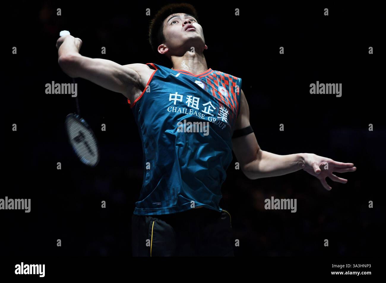 Taiwan's Lee Chia Hao plays against China's Shi Yu Qi during the men's singles final match at ...