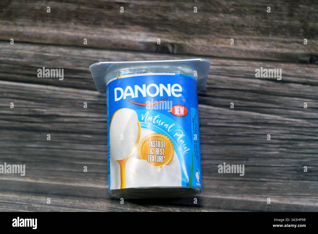 Cairo, Egypt, March 1 2025: Danone natural plain Yogurt, Danone S.A. is ...