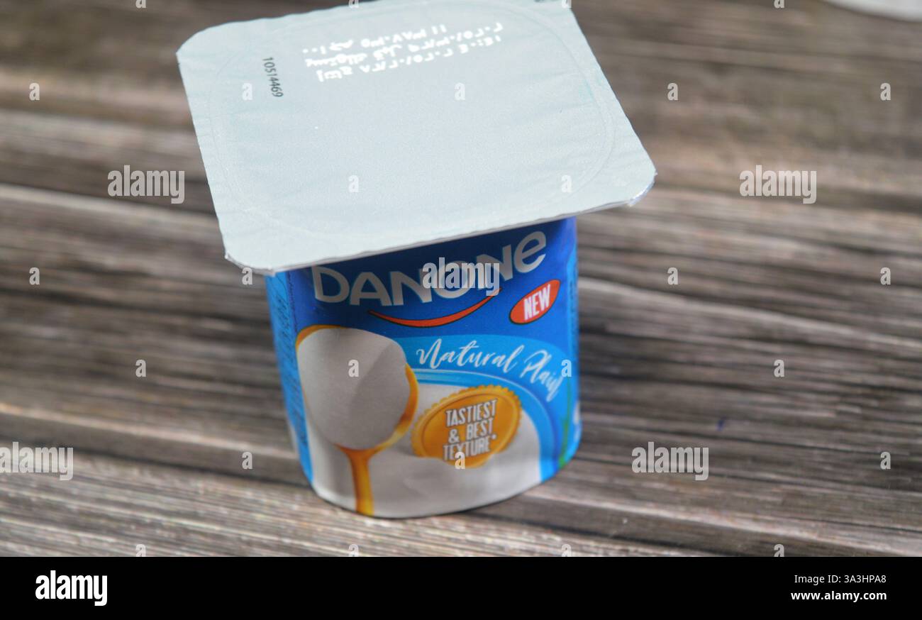 Cairo, Egypt, March 1 2025: Danone natural plain Yogurt, Danone S.A. is ...