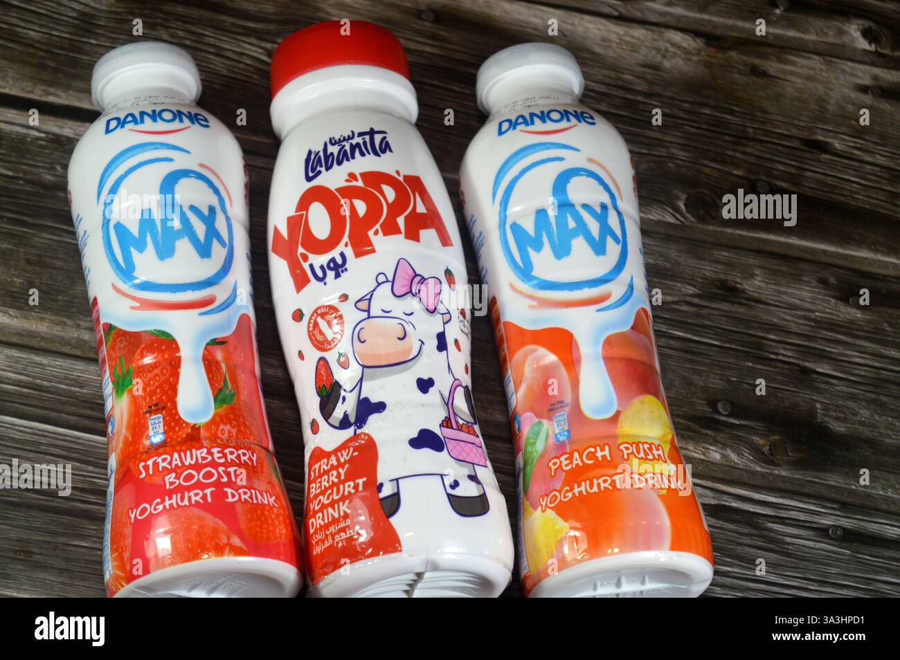 Cairo, Egypt, March 5 2025: Yogurt drink with strawberry and peach ...