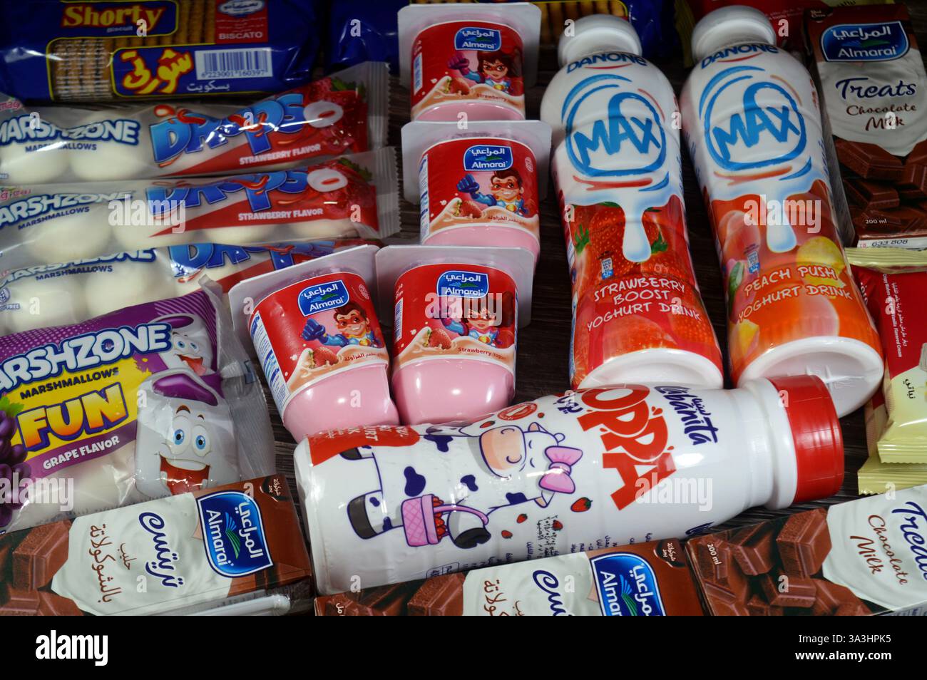 Cairo, Egypt, March 5 2025: assorted drinks, biscuits, yogurt and ...