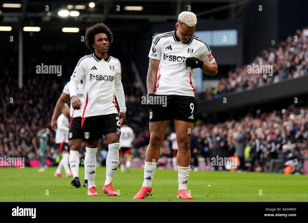 Fulham's Rodrigo Muniz (right) celebrates with Willian after scoring ...