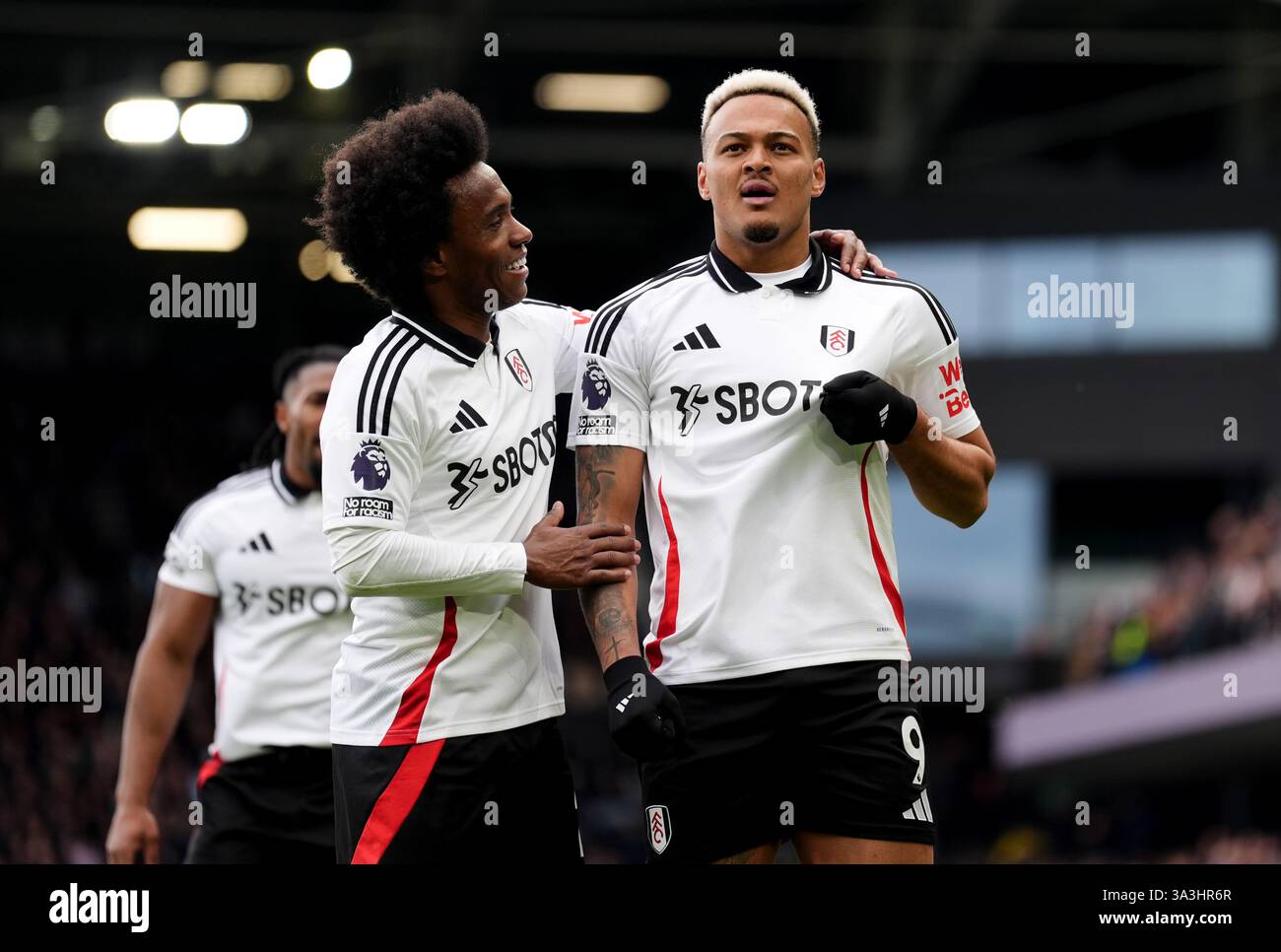 Fulham's Rodrigo Muniz (right) celebrates with Willian after scoring ...