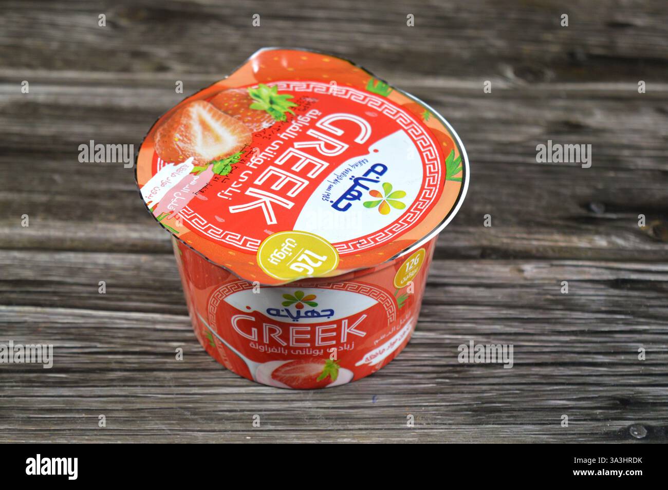 Cairo, Egypt, March 10 2025: Juhayna Greek yogurt with strawberry ...