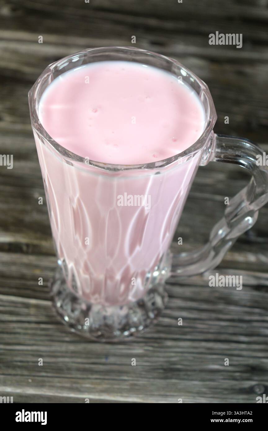 A strawberry taste yogurt drink , fermented milk drink, a glass of ...