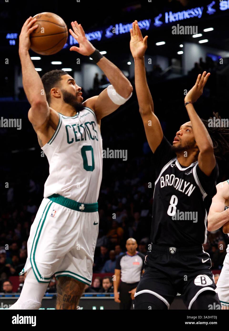 Boston Celtics forward Jayson Tatum (0) drives to the basket against ...