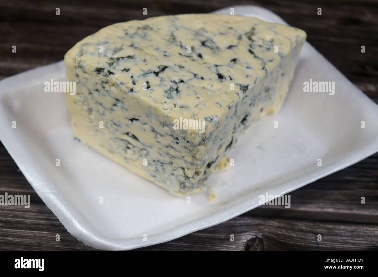 Triangle of a blue cheese, any cheese made with the addition of ...