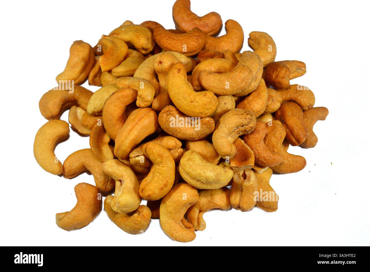 Salted and roasted Cashew nuts, Cashew is the common name of a tropical ...