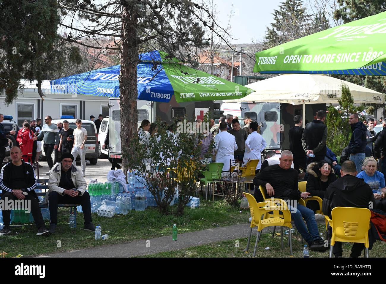 Families and friends outside the hospital where the victims are being treated after fire a in ...