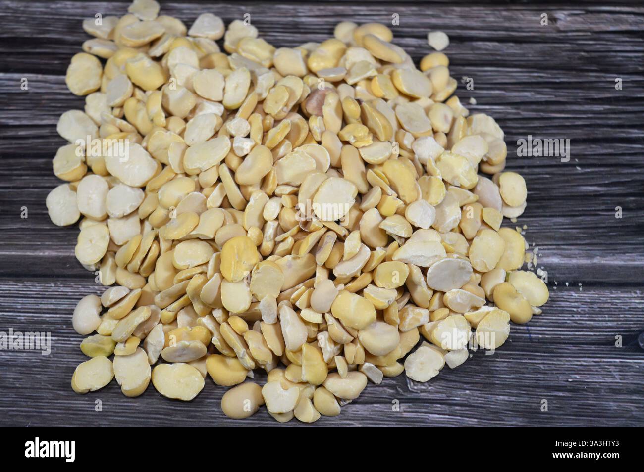 Crushed broad beans, Dried uncooked Egyptian fava beans which is the ...