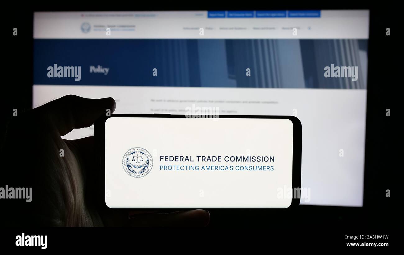 In this photo illustration, a cellphone with the logo of US government ...