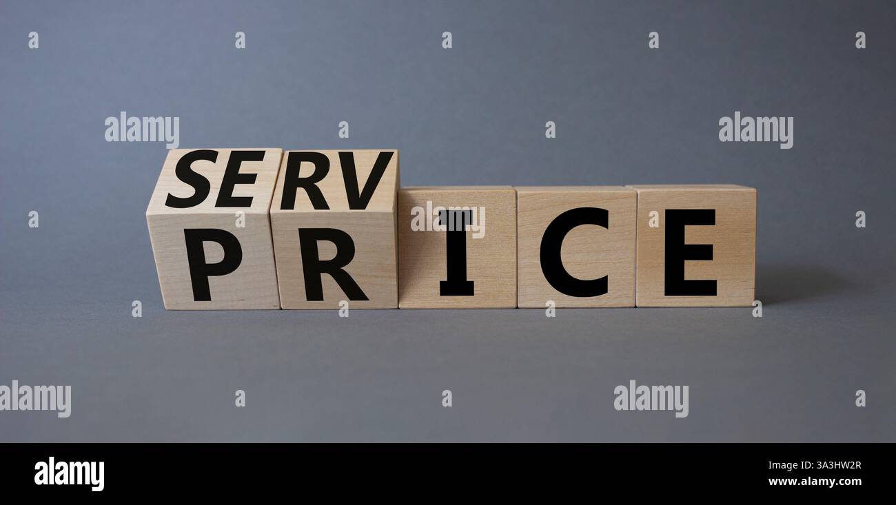 Service and price symbol. Turned wooden cubes with words service and ...