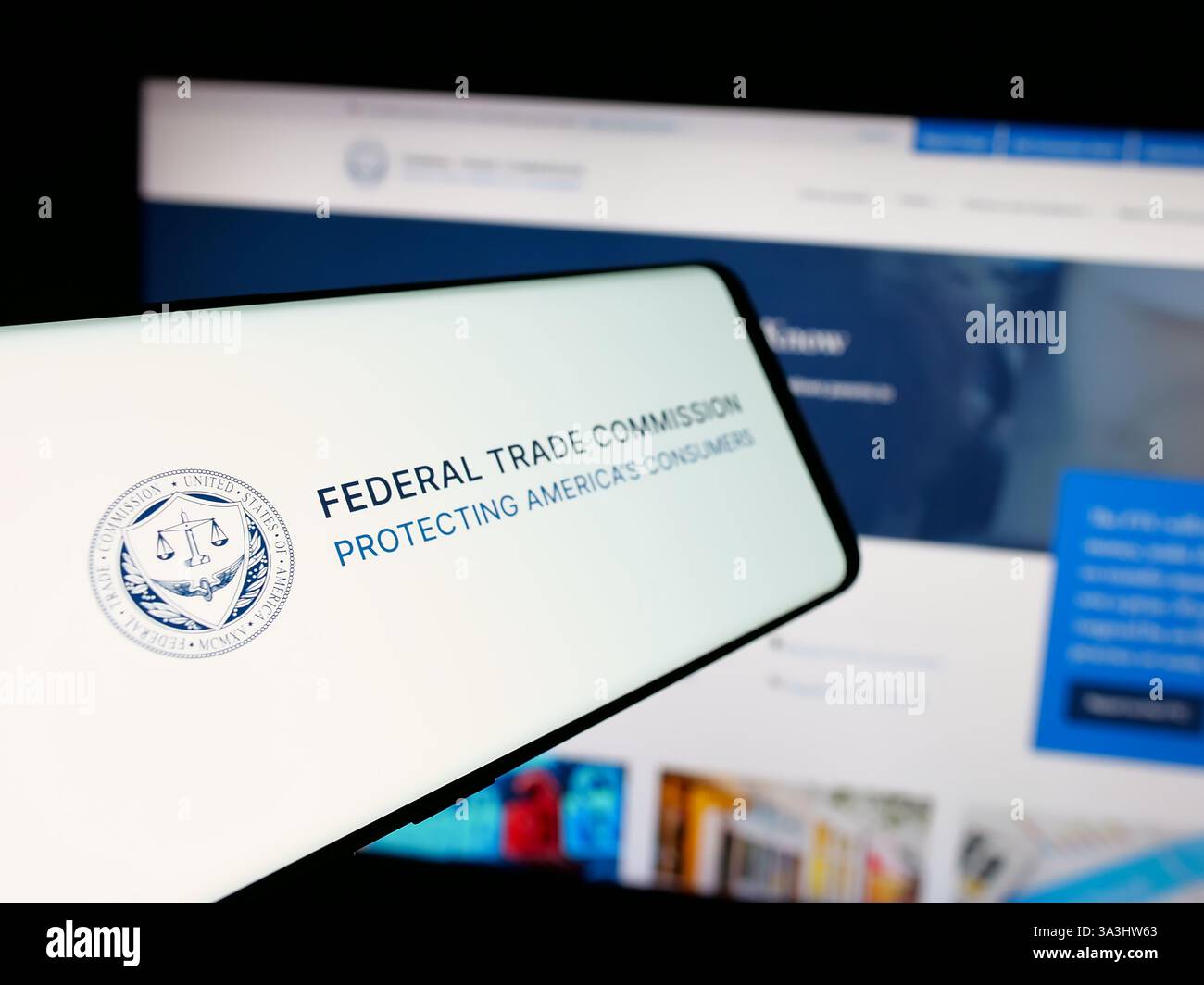 In this photo illustration, a smartphone with the logo of American ...