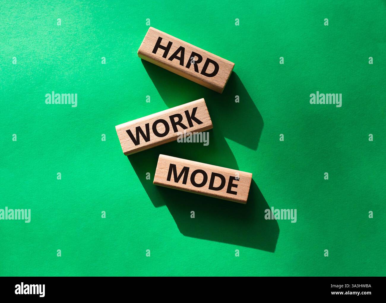 Hard Work Mode symbol. Concept word Hard Work Mode on wooden blocks ...