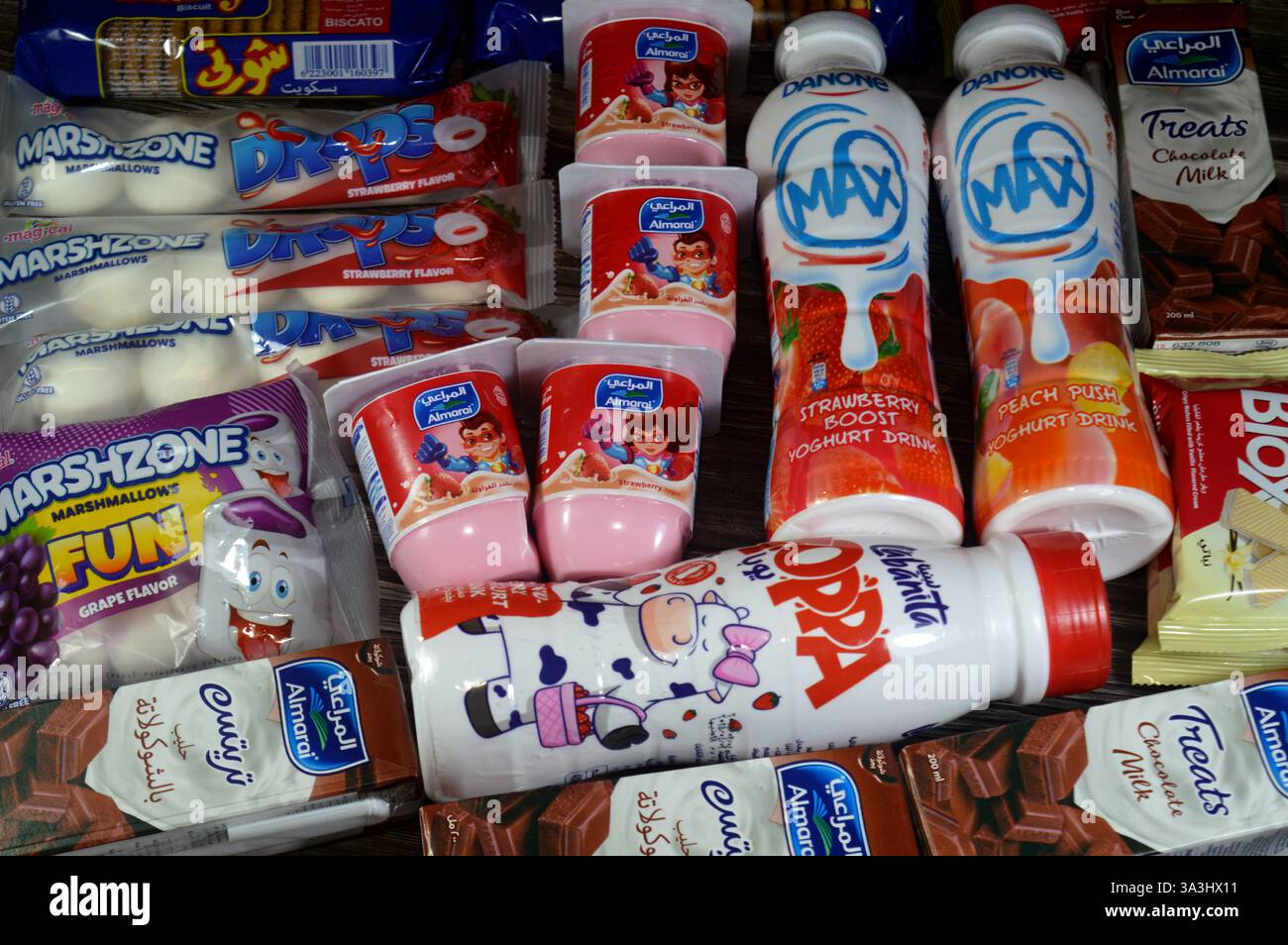 Cairo, Egypt, March 5 2025: assorted drinks, biscuits, yogurt and ...