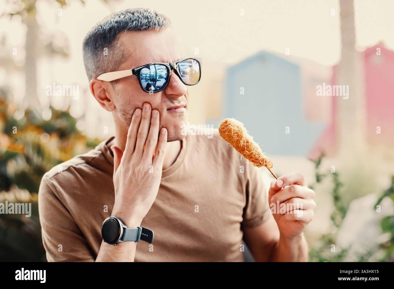 Man eating crispy shrimp kataifi experiences sudden toothache on ...