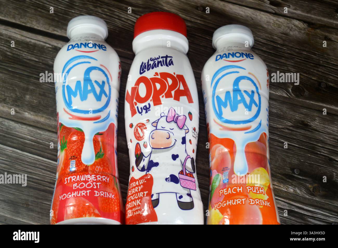 Cairo, Egypt, March 5 2025: Yogurt drink with strawberry and peach ...