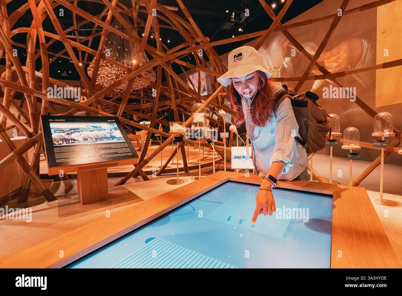 16 January 2025, Abu Dhabi, UAE: Tourist enjoying interactive museum ...