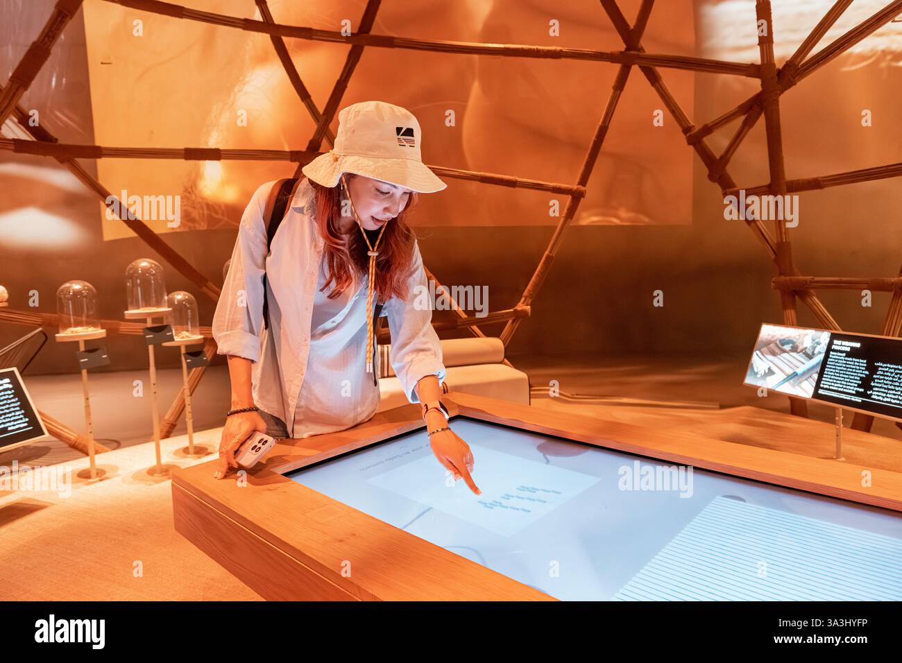 16 January 2025, Abu Dhabi, UAE: Tourist enjoying interactive museum ...