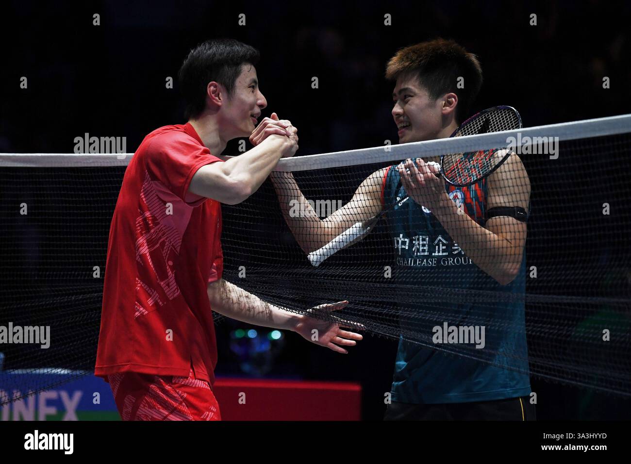 China's Shi Yu Qi, left, greets his opponent Taiwan's Lee Chia Hao after defeating him in the ...