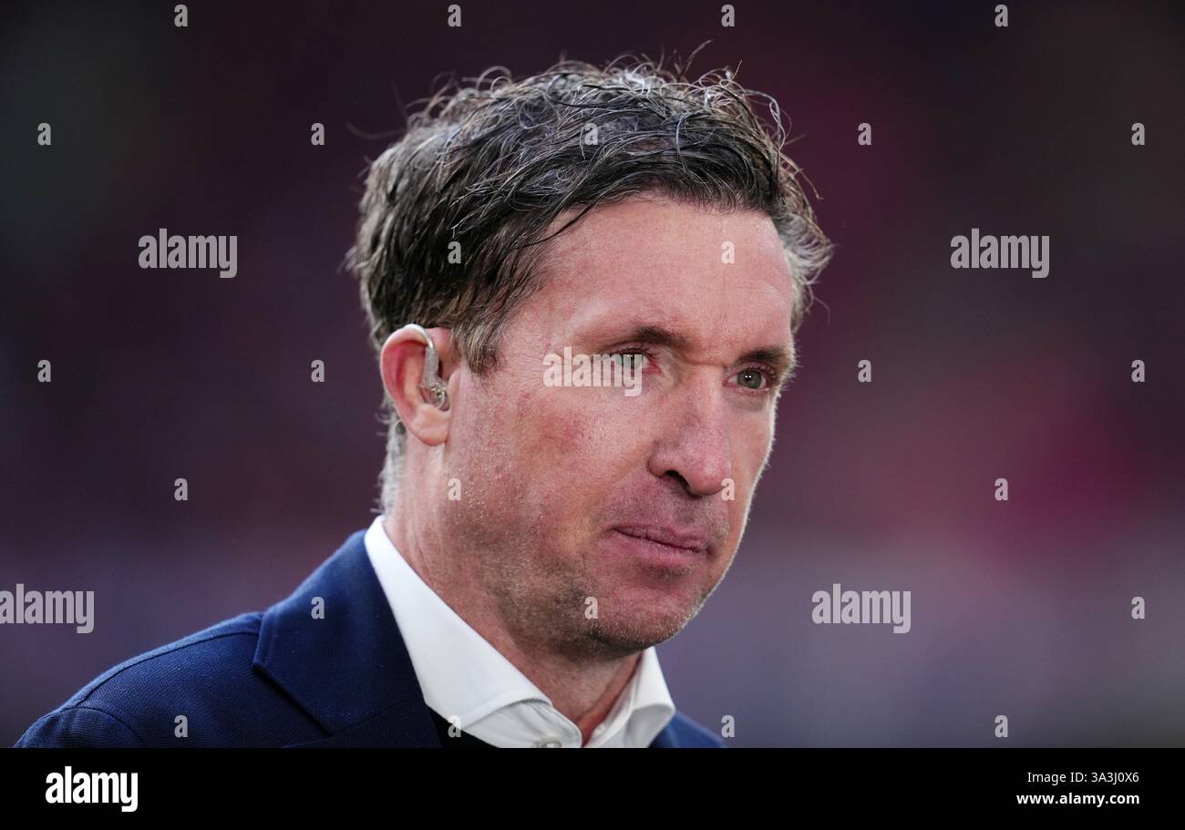 Former Liverpool player Robbie Fowler ahead of the Carabao Cup final at ...