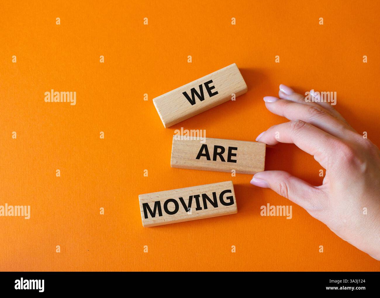 We are moving symbol. Concept word We are moving on wooden blocks ...