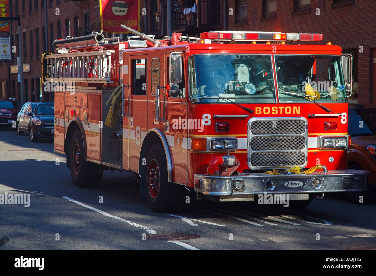 A typical Boston firefigther red truck fire engine in downtown Boston ...