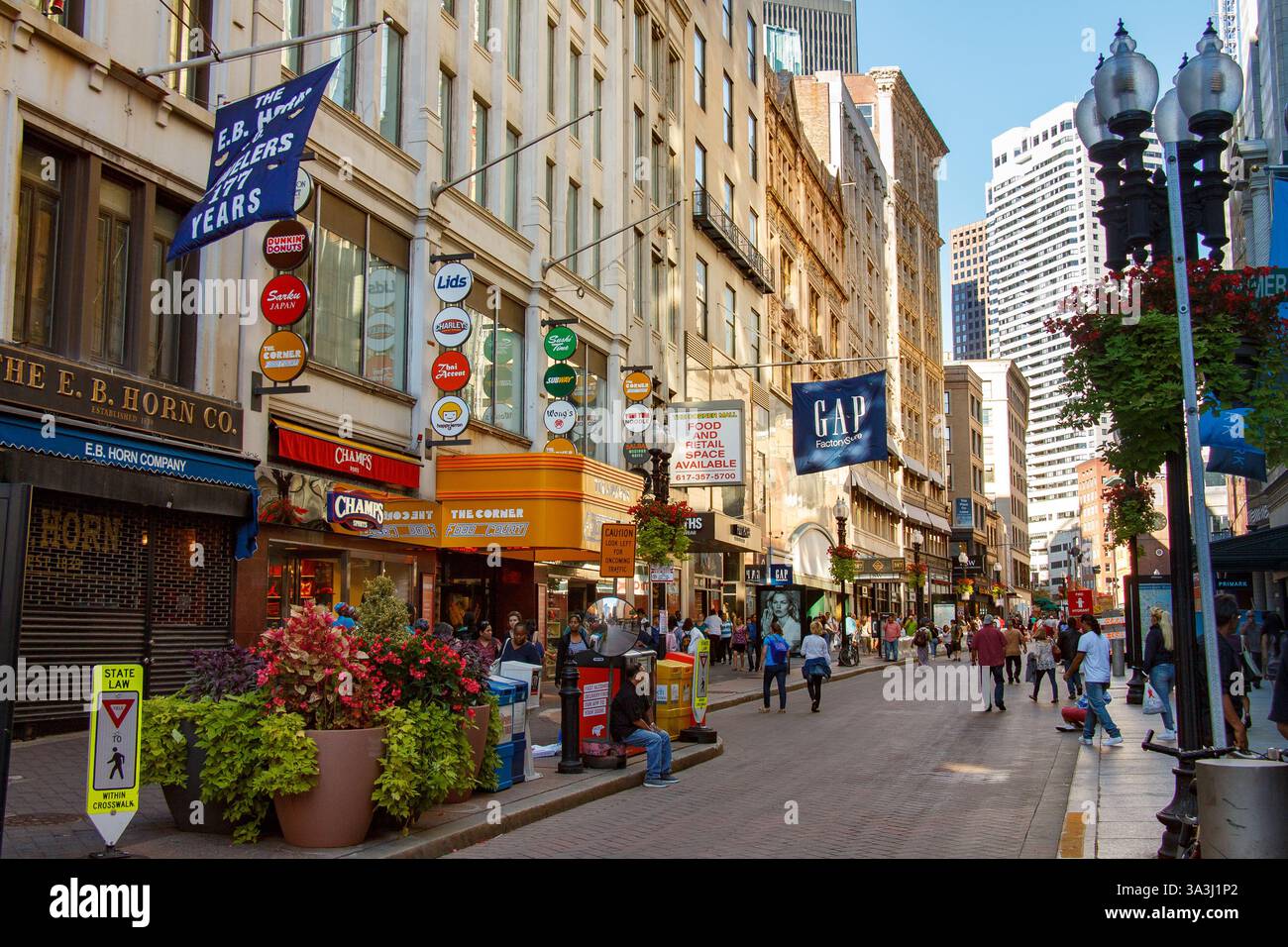 A Busy street with restaurants and the Historical buildings in downtown ...