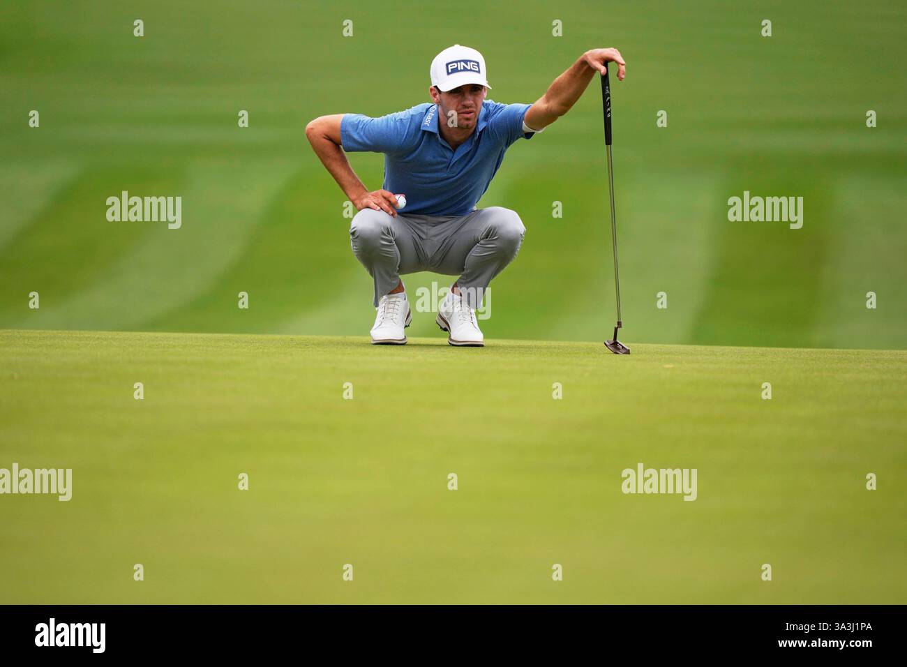Alex Smalley lines up a shot on the second green during the final round ...