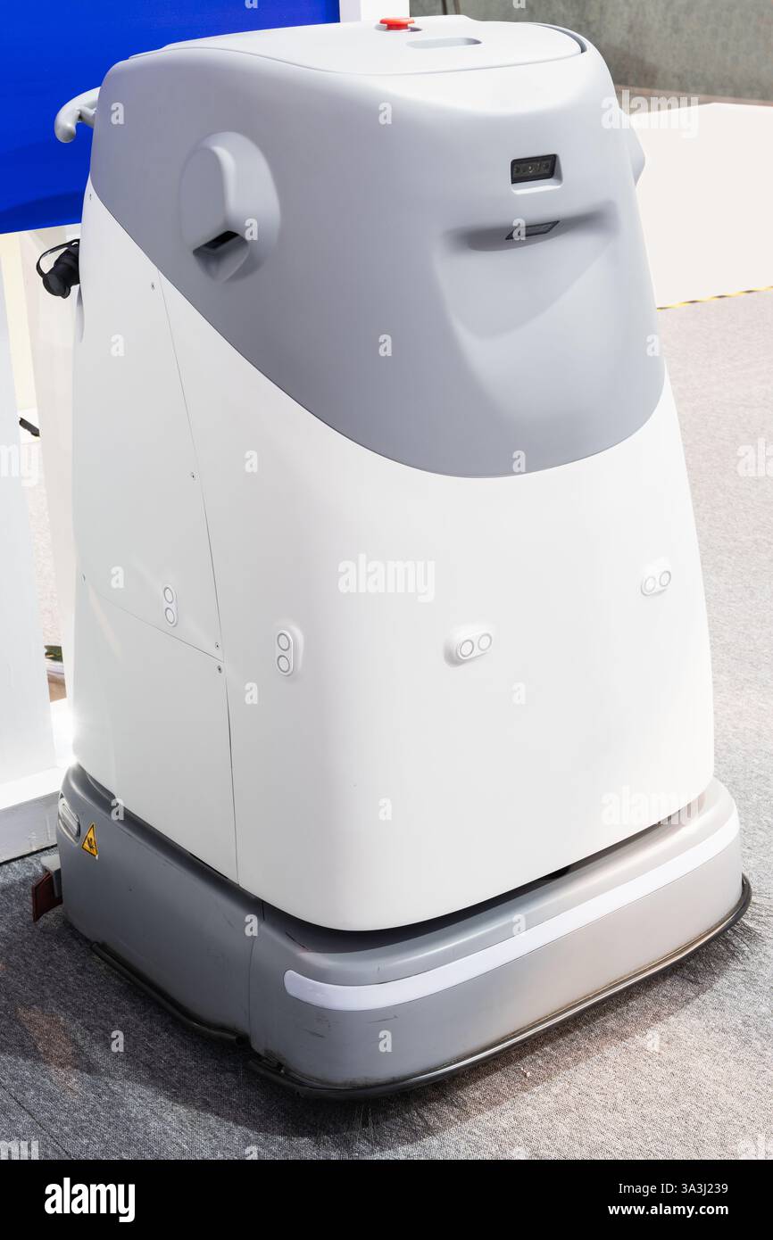 Industrial robot vacuum cleaner at work Stock Photo - Alamy