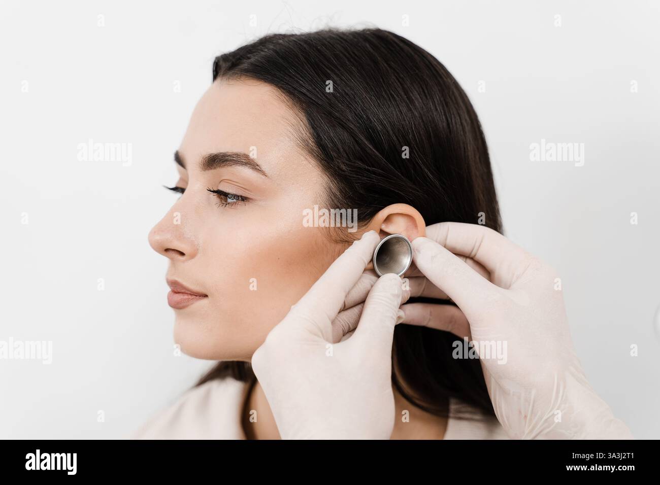 Consultation with otolaryngologist. Treatment of woman ear pain ...