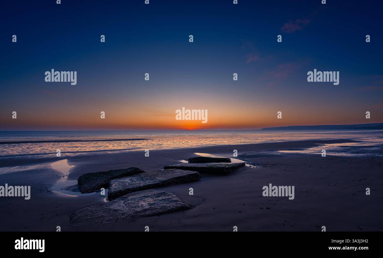Primrose Valley beach near Filey just as the sun is starting to apear ...