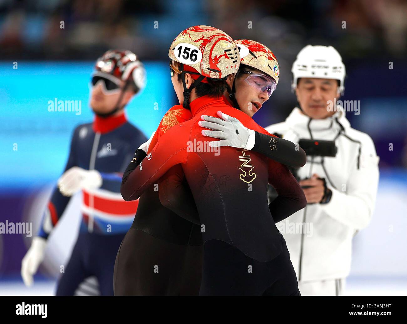 Beijing, China. 16th Mar, 2025. Liu Shaoang (back) hugs Liu Guanyi of ...