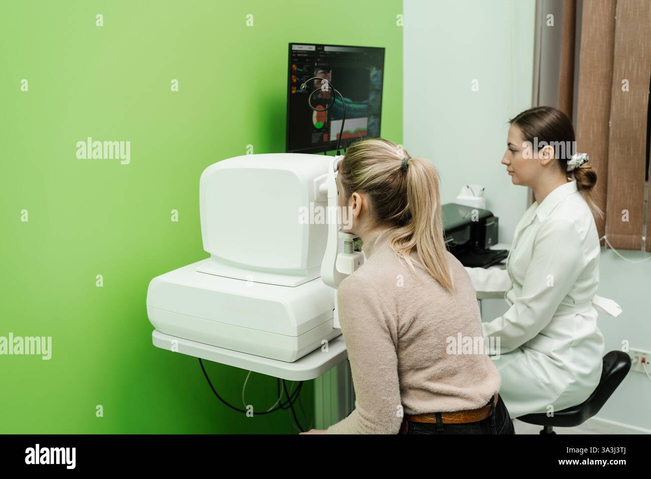 Optical coherence tomography OCT scan to create pictures of the back of ...