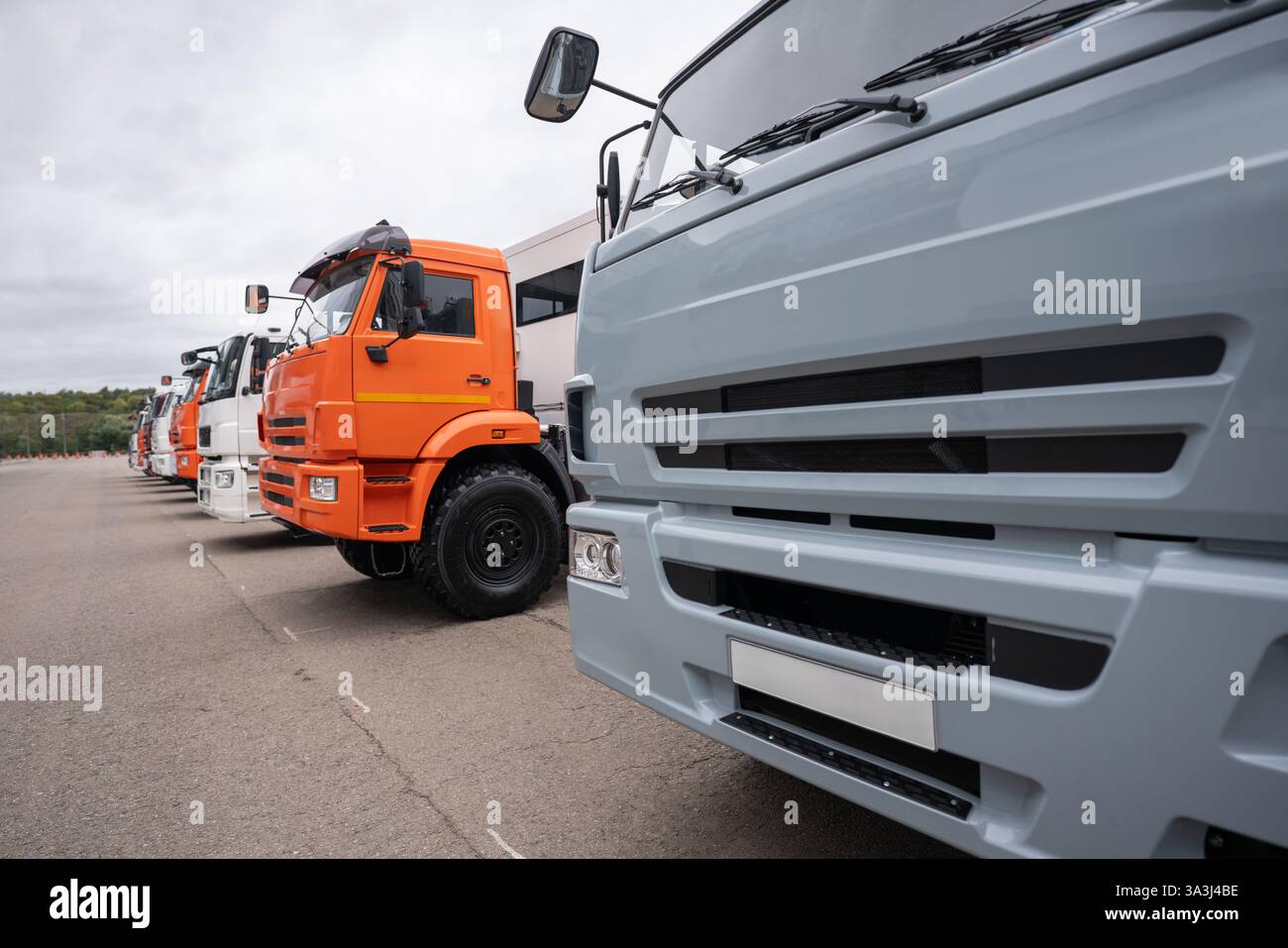 Cement construction trucks row hi-res stock photography and images - Alamy