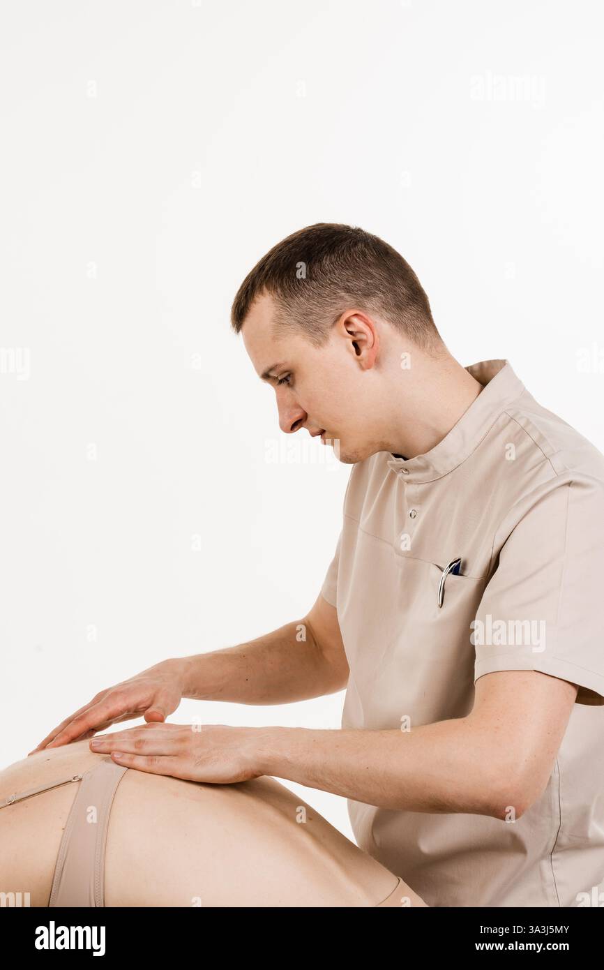 Examination of scoliotic deformity of the lumbar spine. Scoliosis is ...