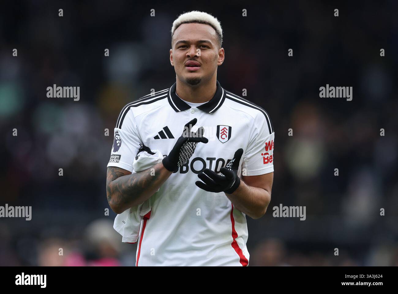 London, UK. 16th Mar, 2025. Rodrigo Muniz of Fulham appluads the fans ...
