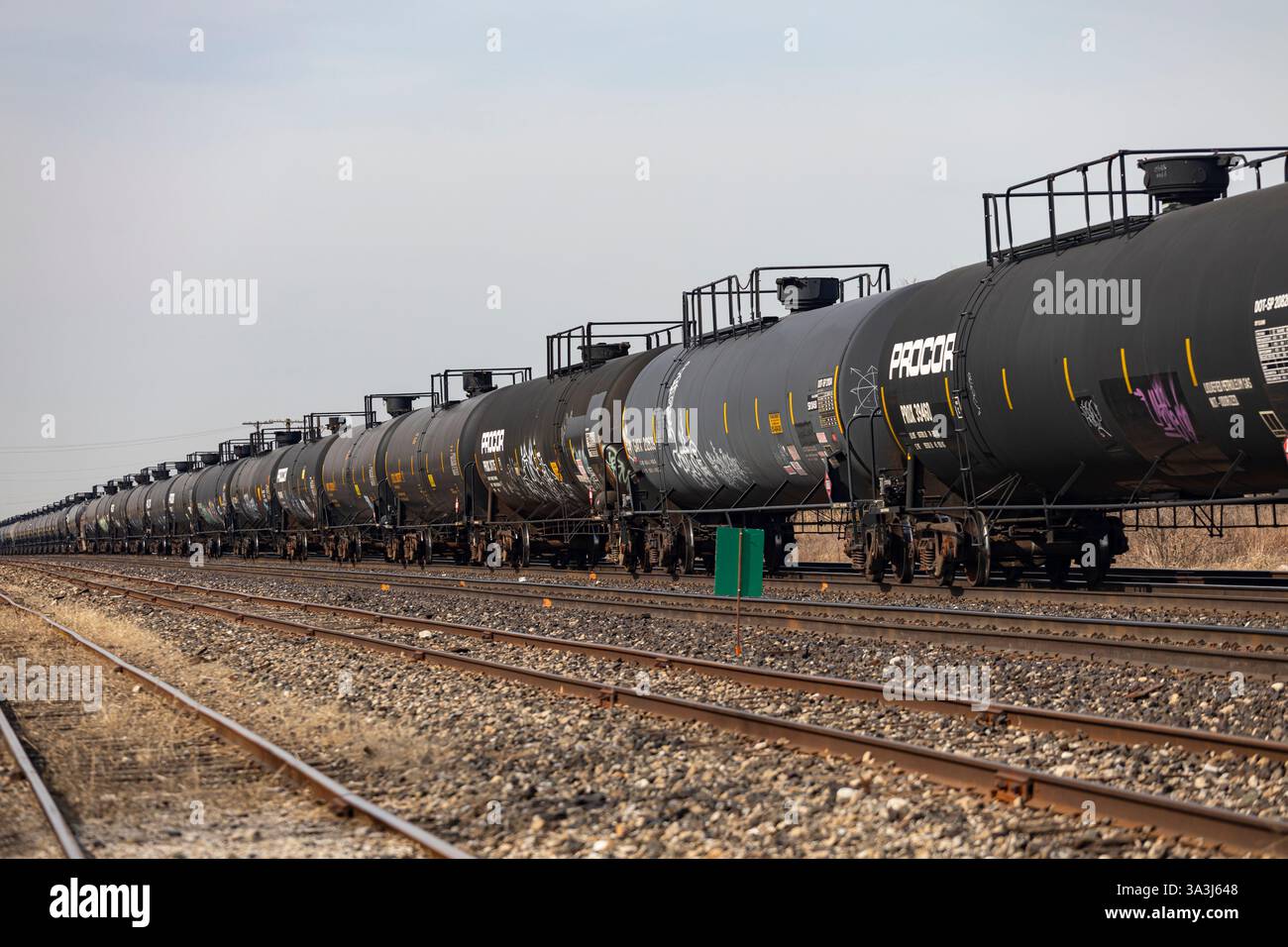 A freight train with tanker cars on rail tracks Ontario Canada Stock ...