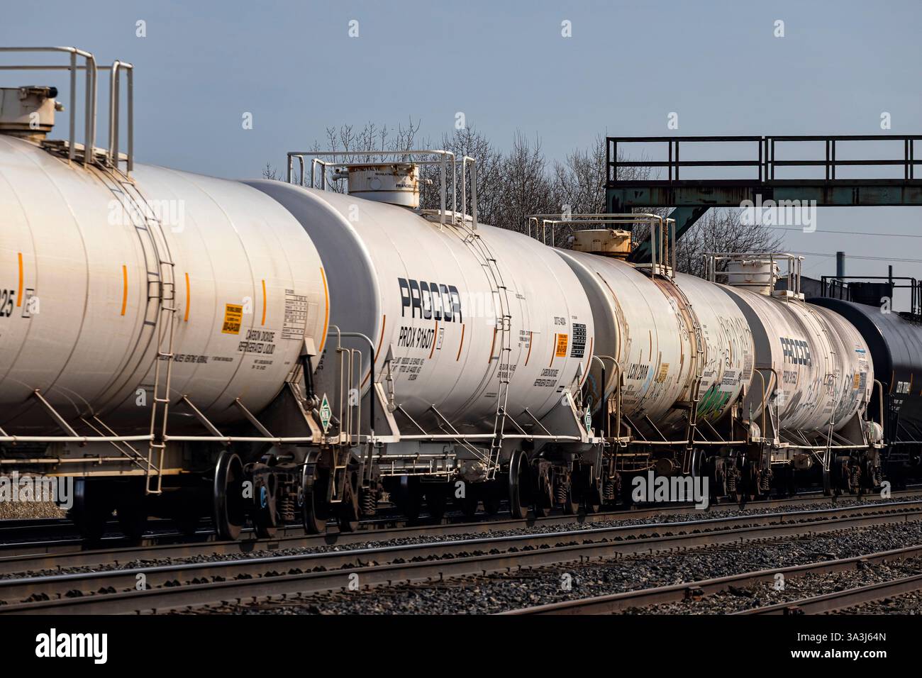 A freight train with tanker cars on rail tracks Ontario Canada Stock ...