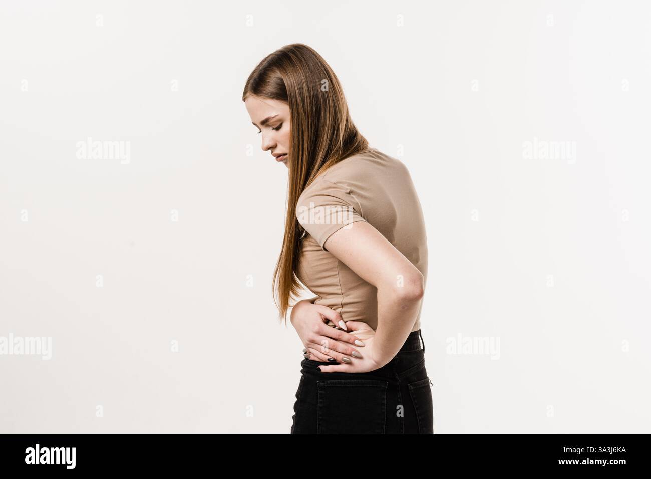 Girl with pelvic inflammatory disease on white background. PID ...