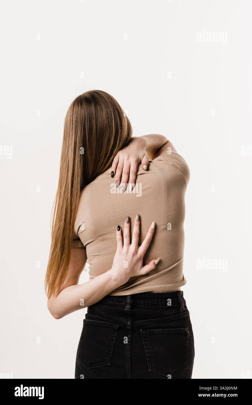 Cervical spine osteochondrosis is radicular syndromes of young woman. Attractive girl feel spine ...