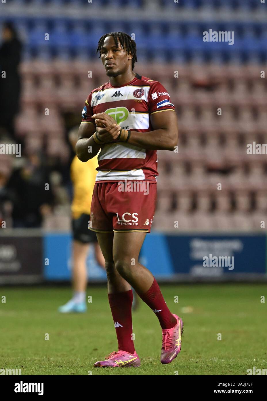 Wigan Warriors' Junior Nsemba applauds fans at full time following the ...