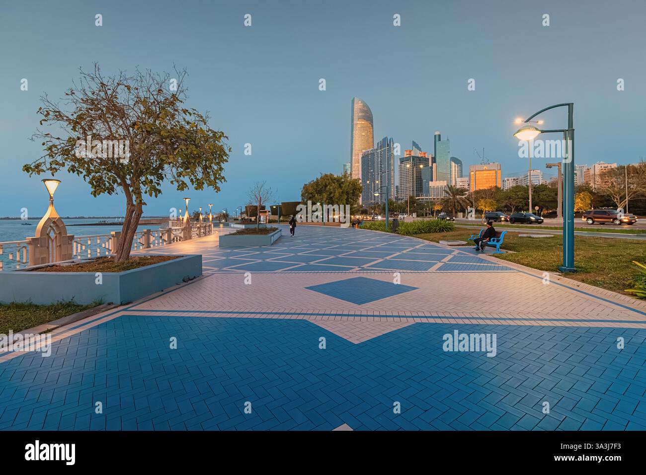 16 January 2025, Abu Dhabi, UAE: Empty promenade with illuminated ...