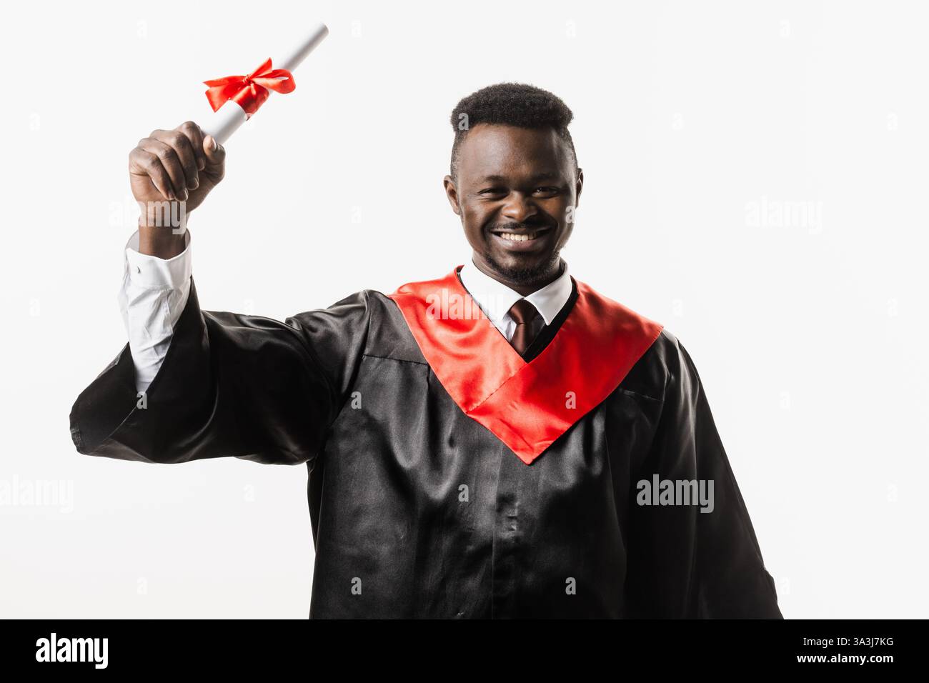 Graduate african man is graduating college and celebrating academic ...